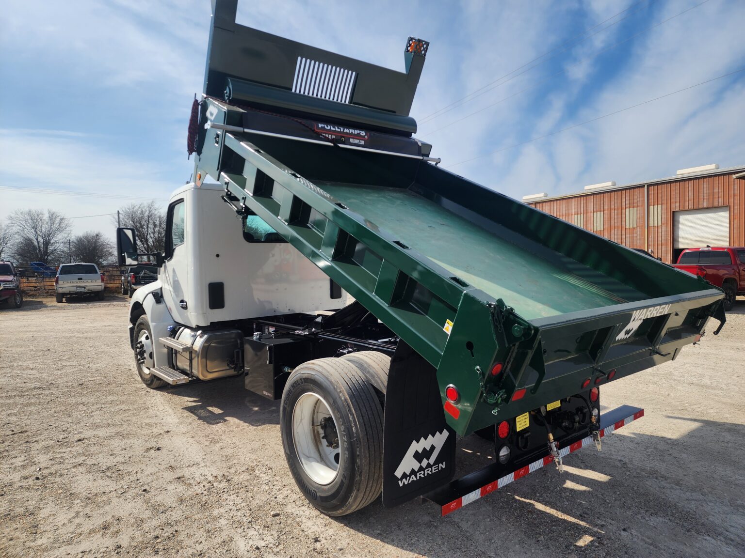 Contractor Dumping Flatbed Body: Built for Heavy-Duty Hauling